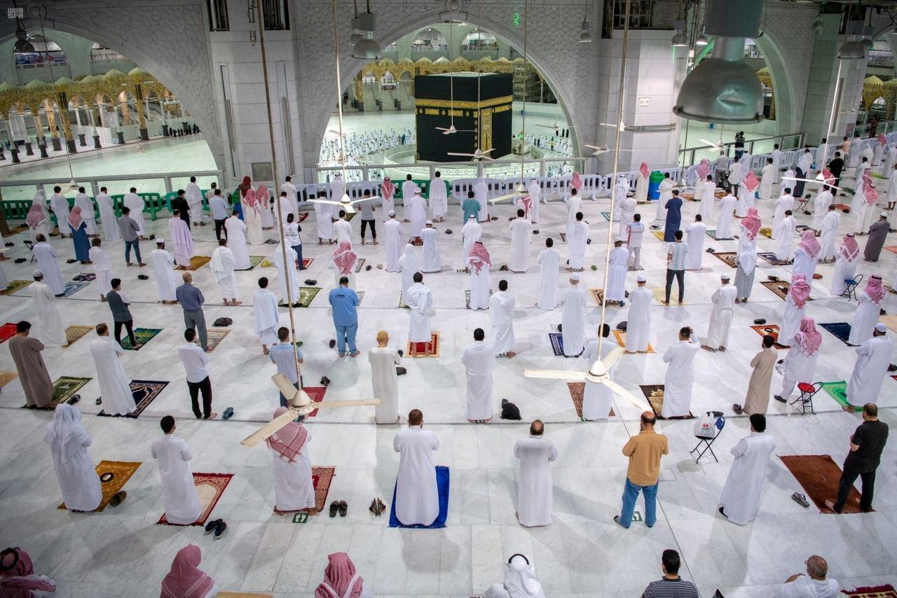 Muslims pray in the Grand Mosque in the holy city of Mecca, Saudi ...