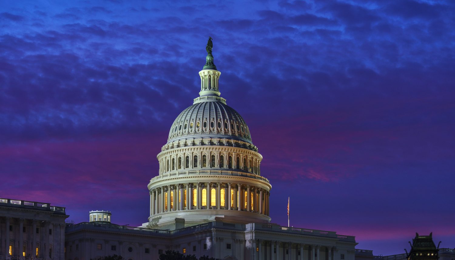 In shades of red and blue, dawn arrives on Capitol Hill in Washington ...